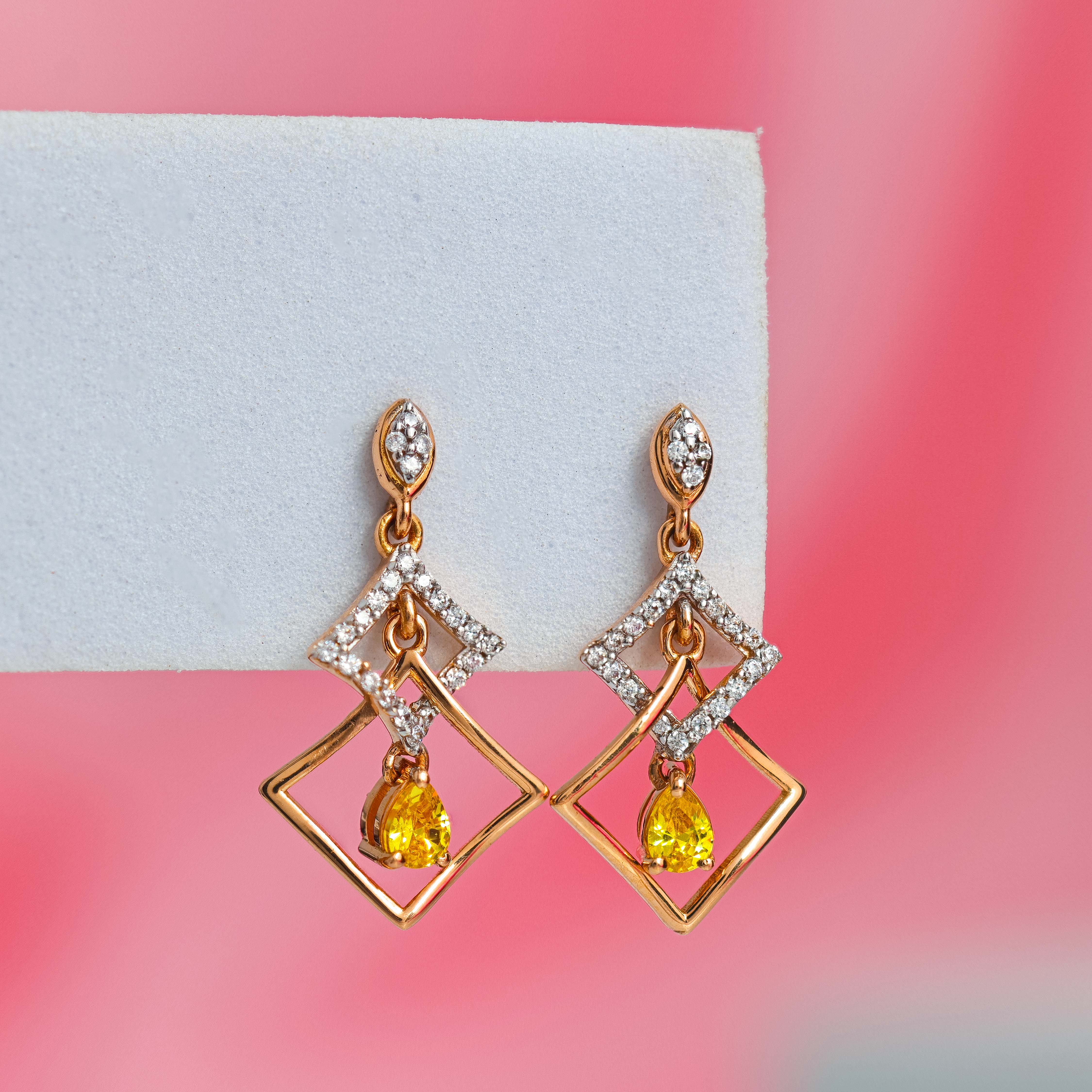 Buy Abstract Geometry Swirl Gold Earrings | GRT Jewellers