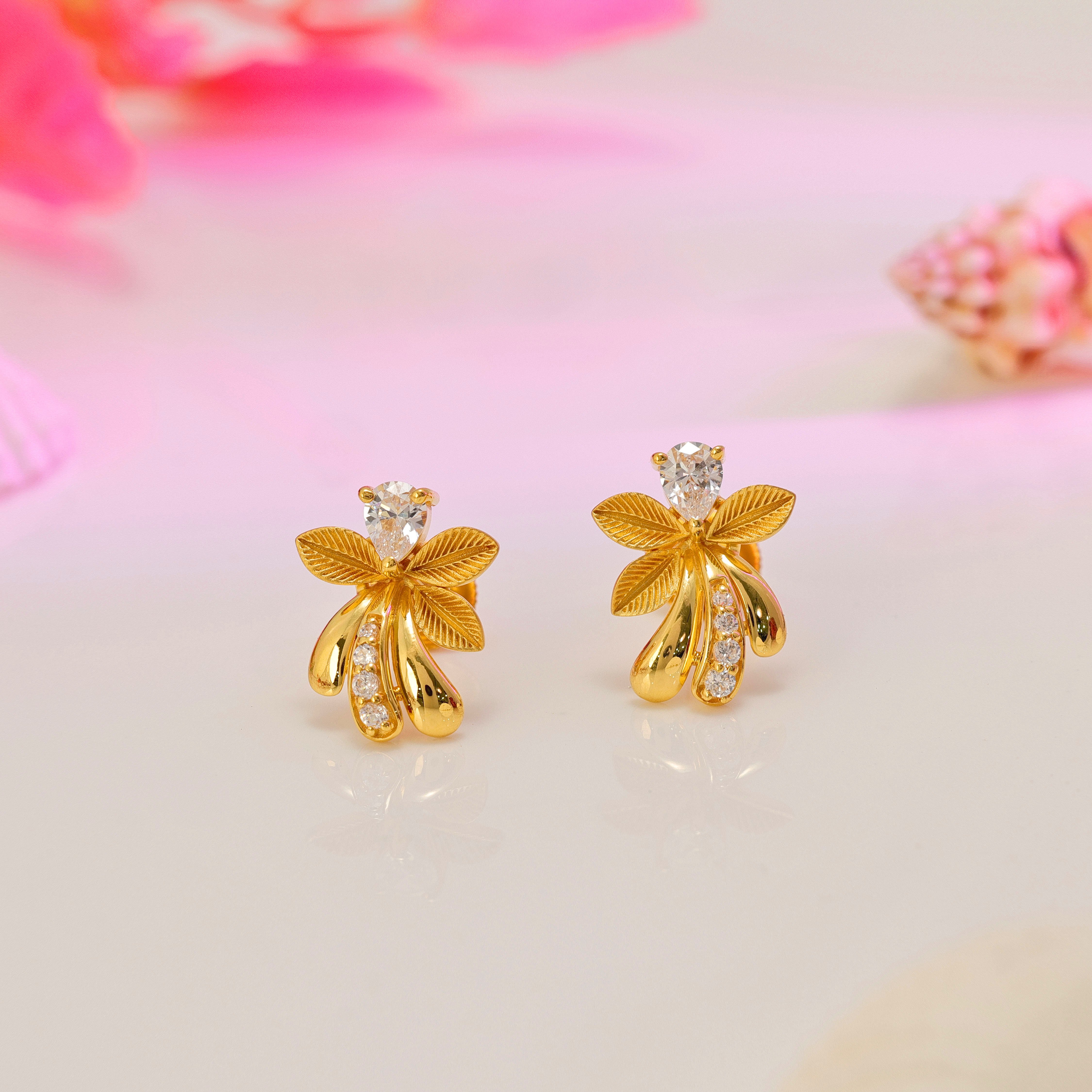 Buy Refined Curved Arch Leaf Gold Studs | GRT Jewellers